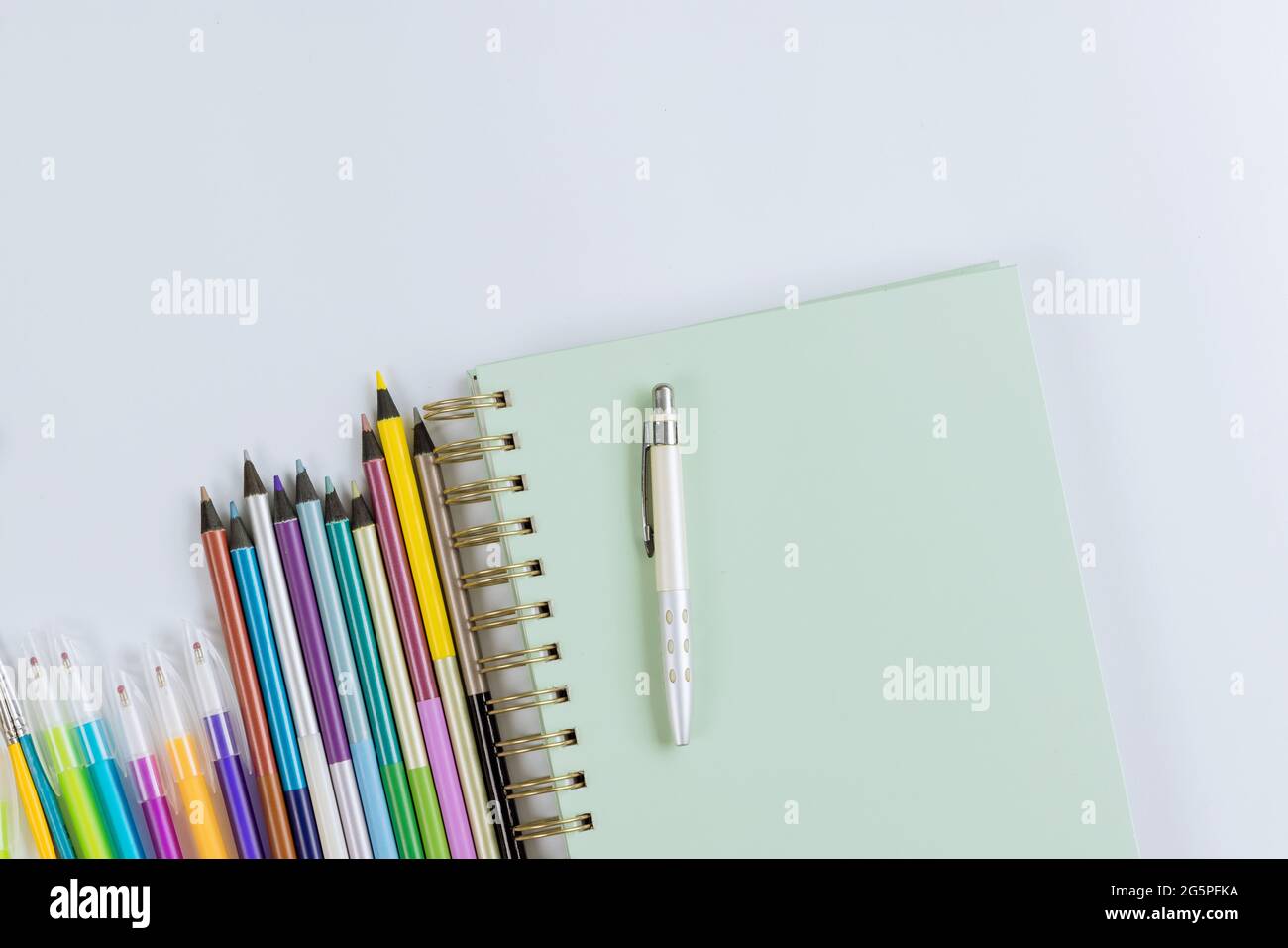 School times in assortment of various school supplies items on ...