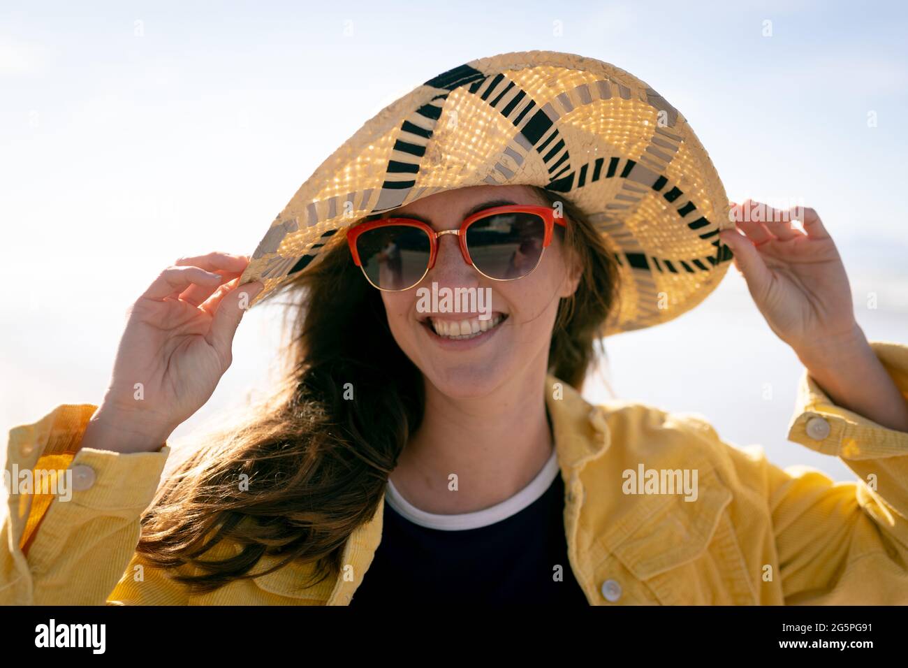 Woman with hat hi-res stock photography and images - Alamy