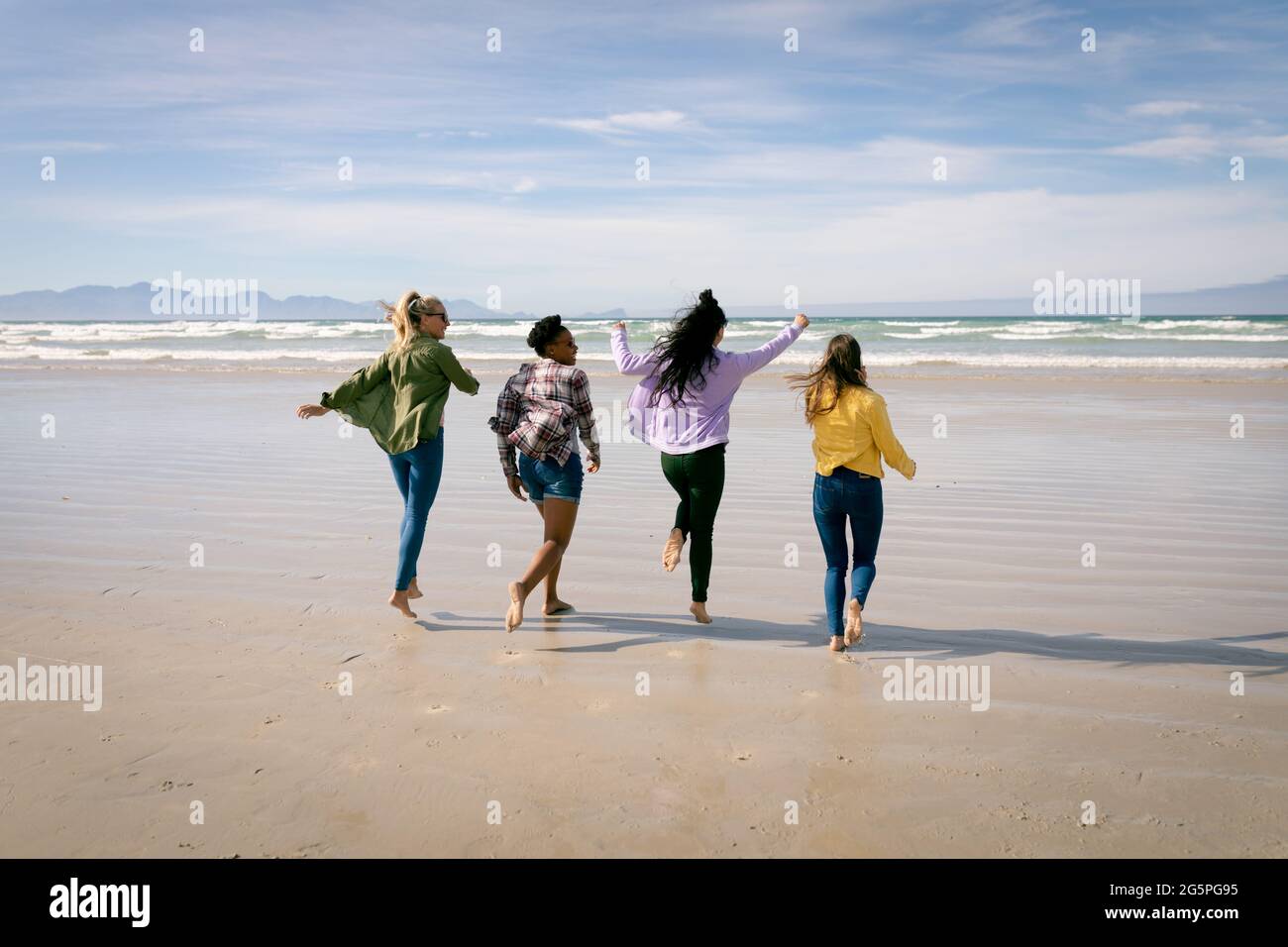 Diverse group walking hi-res stock photography and images - Alamy