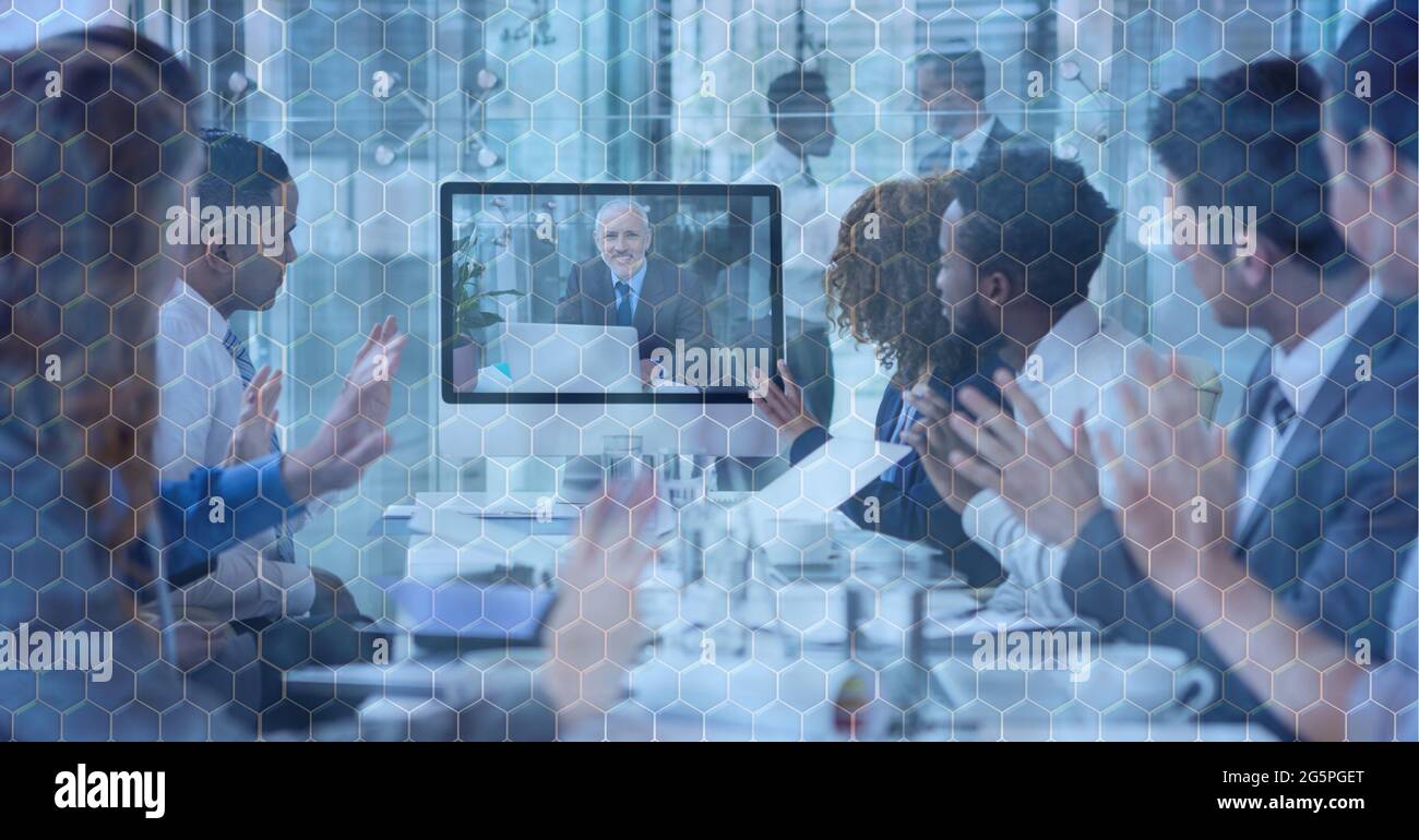 Composition of network of digital screens over people clapping in ...