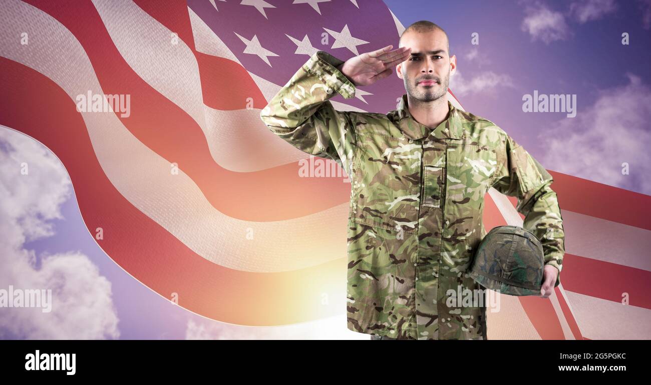 Composition of saluting male soldier holding helmet, against american ...