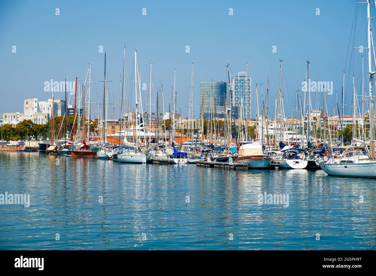 The port of the city of Barcelona with many sailing ships. Europe's ...