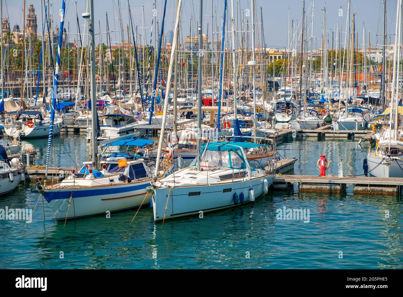The port of the city of Barcelona with many sailing ships. Europe's ...