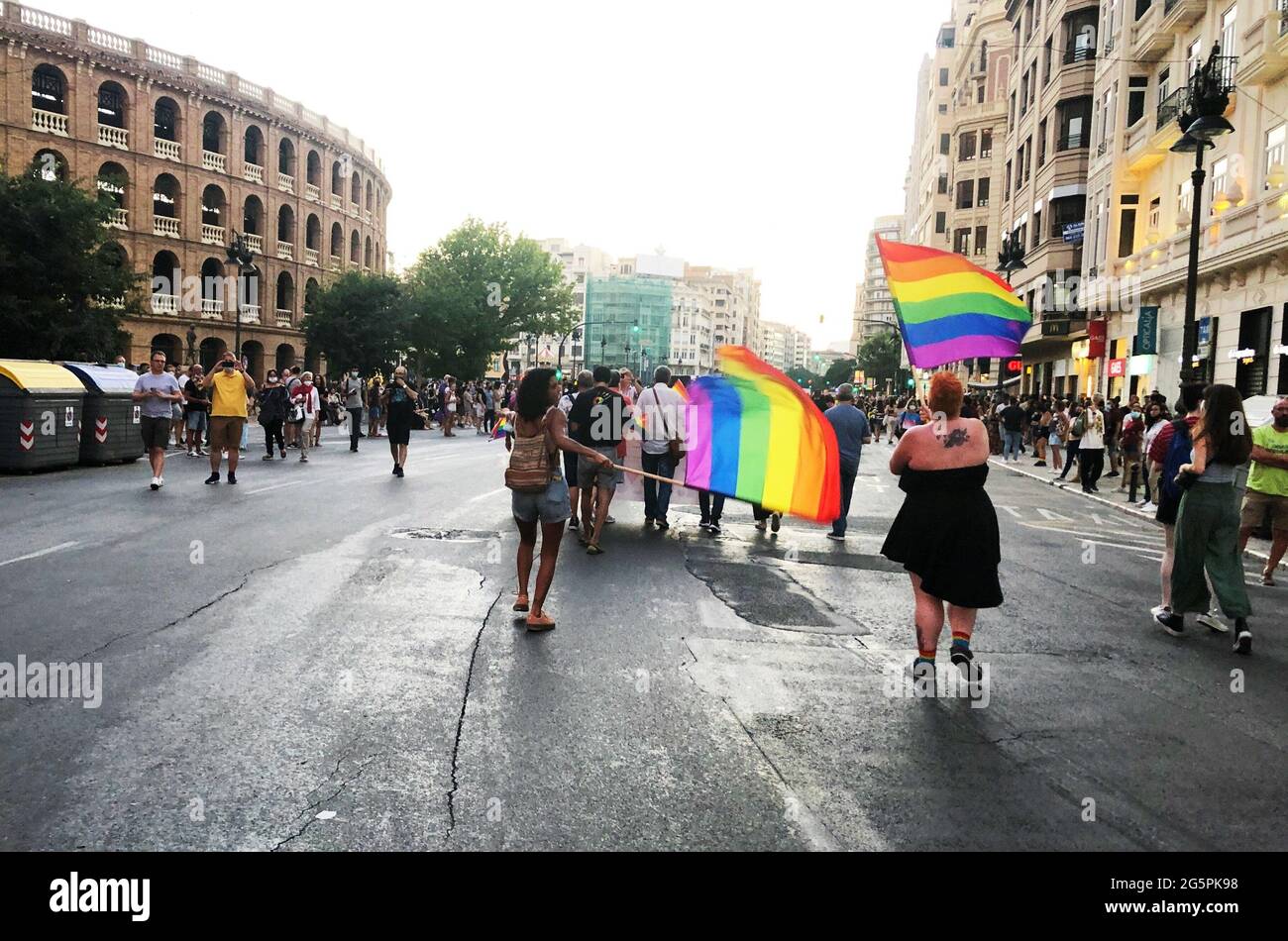 VALENCIA, SPAIN - Jun 28, 2021: Women with flags in LGBT Pride ...