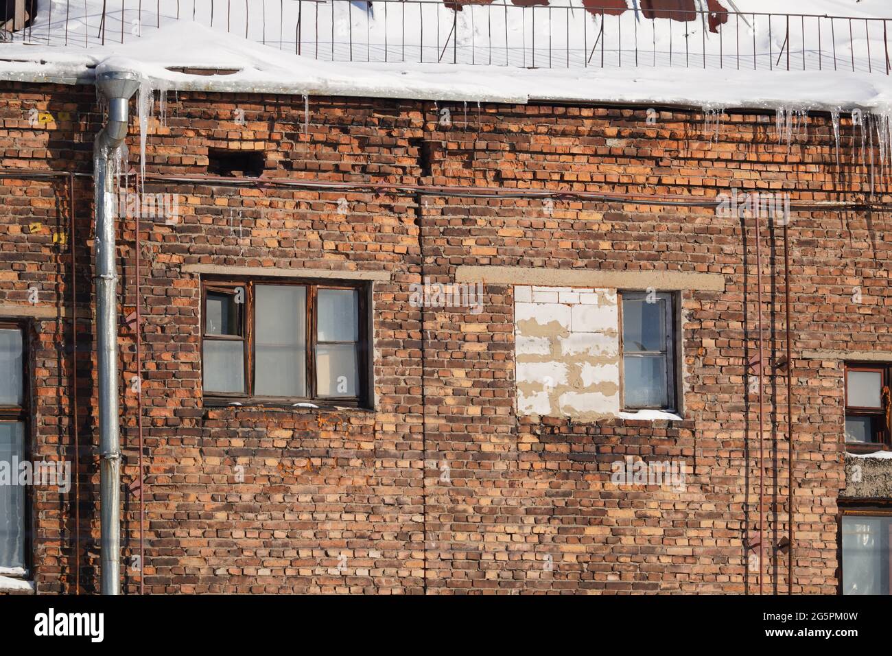 windows on an old brick building Stock Photo - Alamy