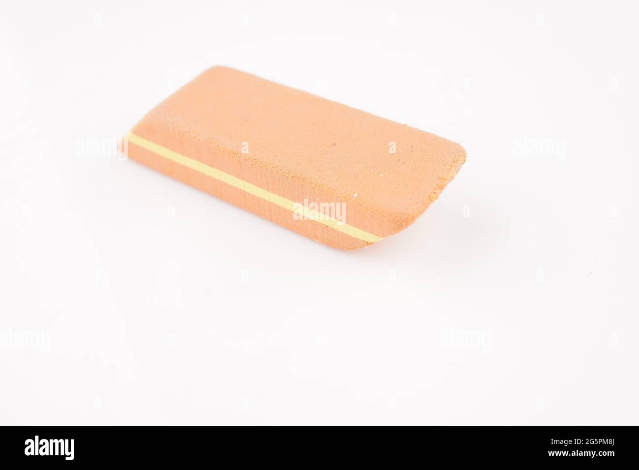 orange eraser on white background Stock Photo - Alamy