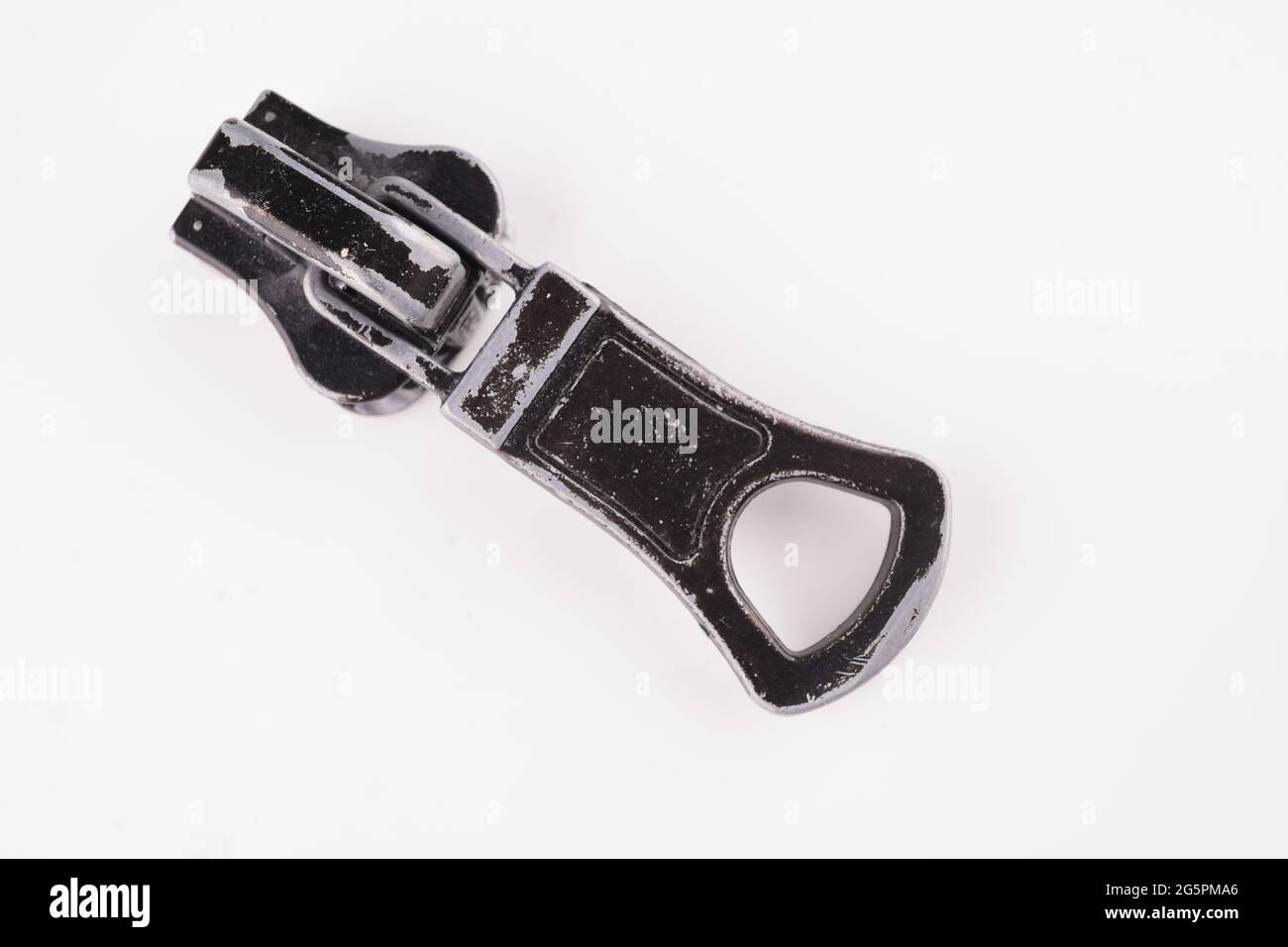 black old zipper slider on white background Stock Photo - Alamy