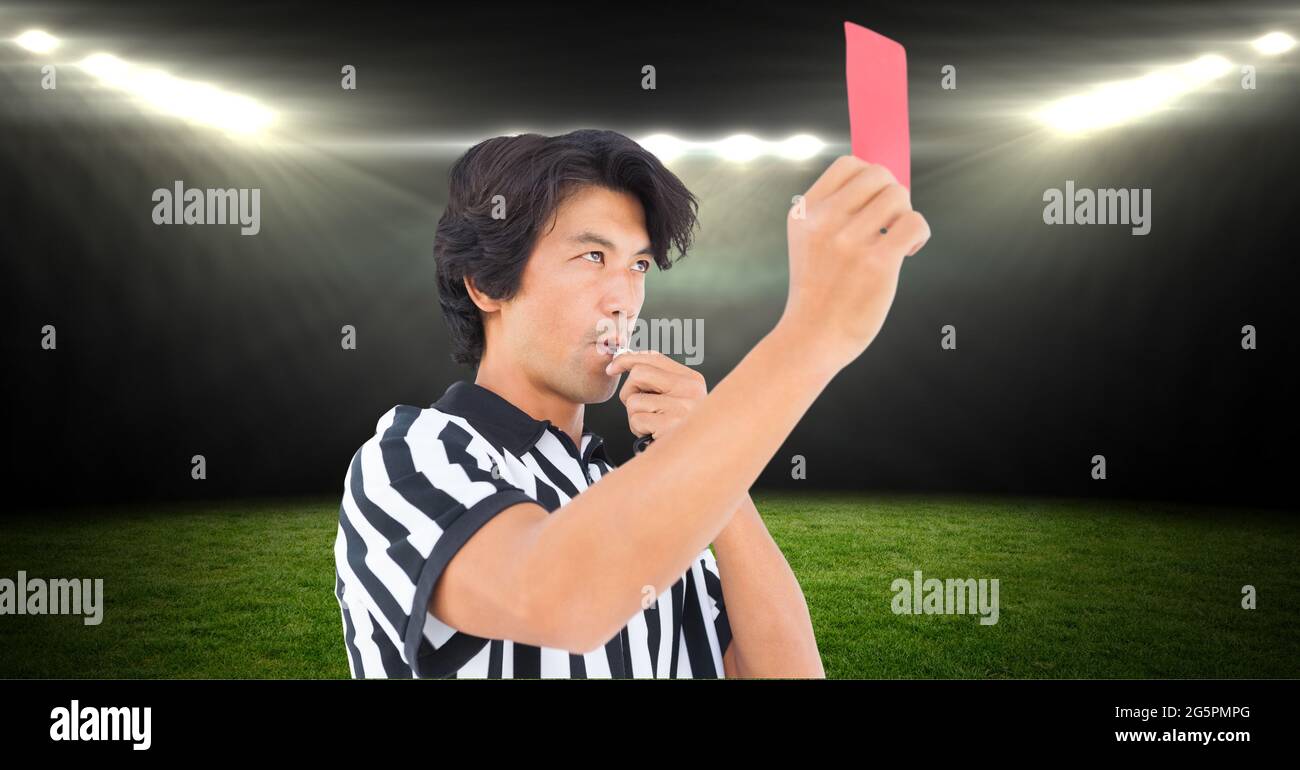 Composition of male referee with red card at football stadium Stock ...