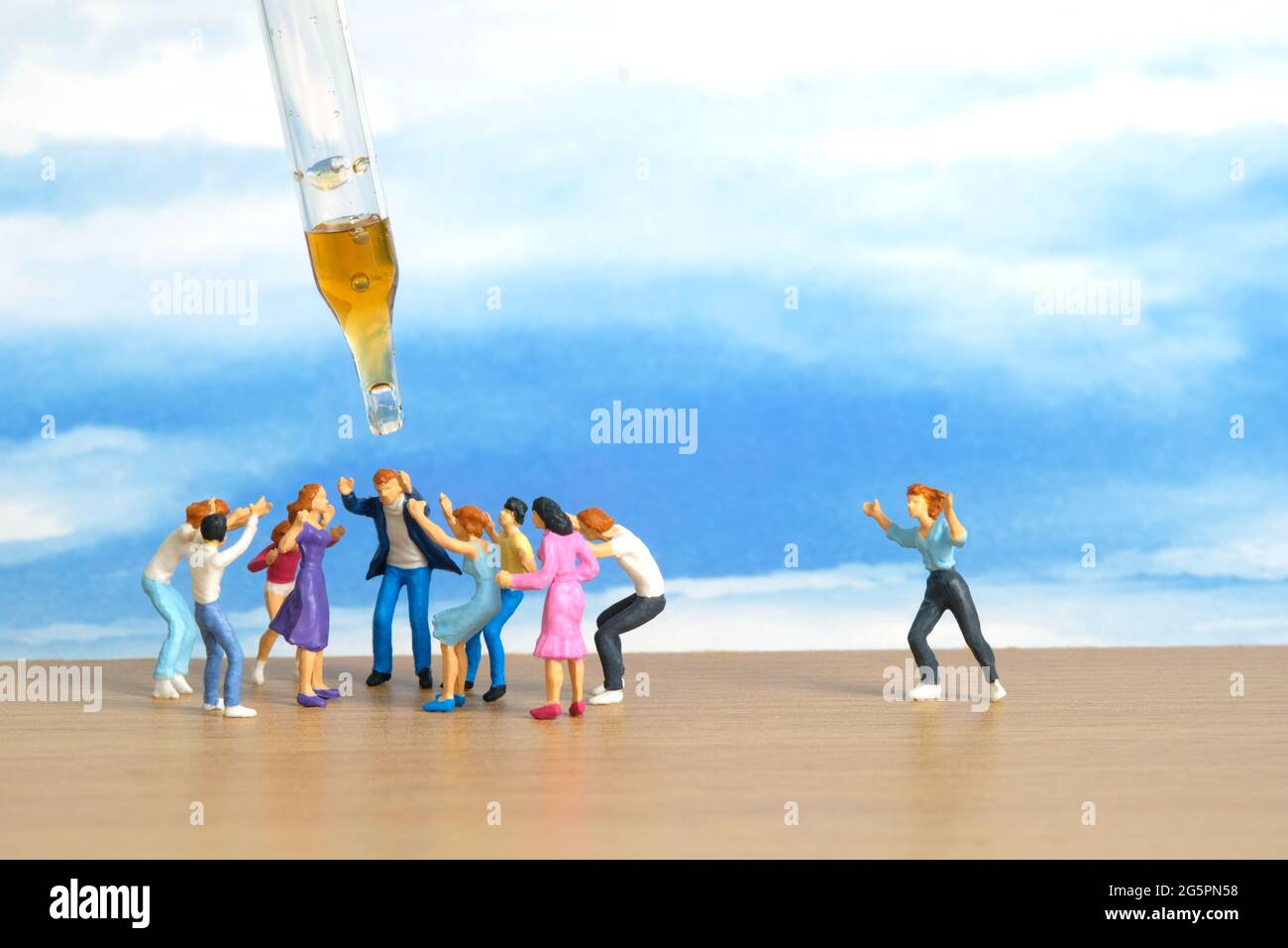 Miniature people toy figure photography. Group of people jostling for ...