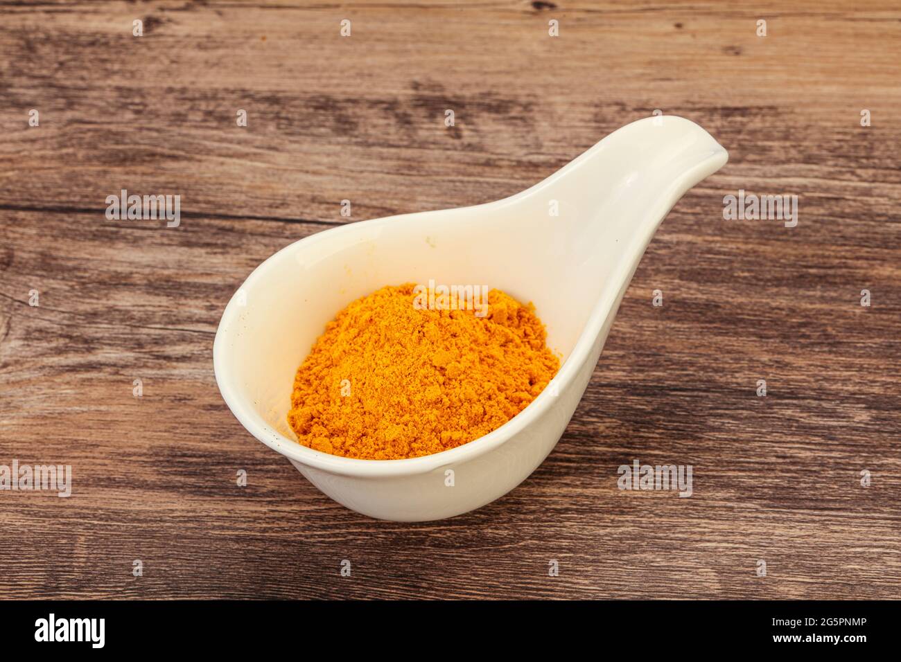 Tumeric - curcuma powder in the bowl Stock Photo - Alamy