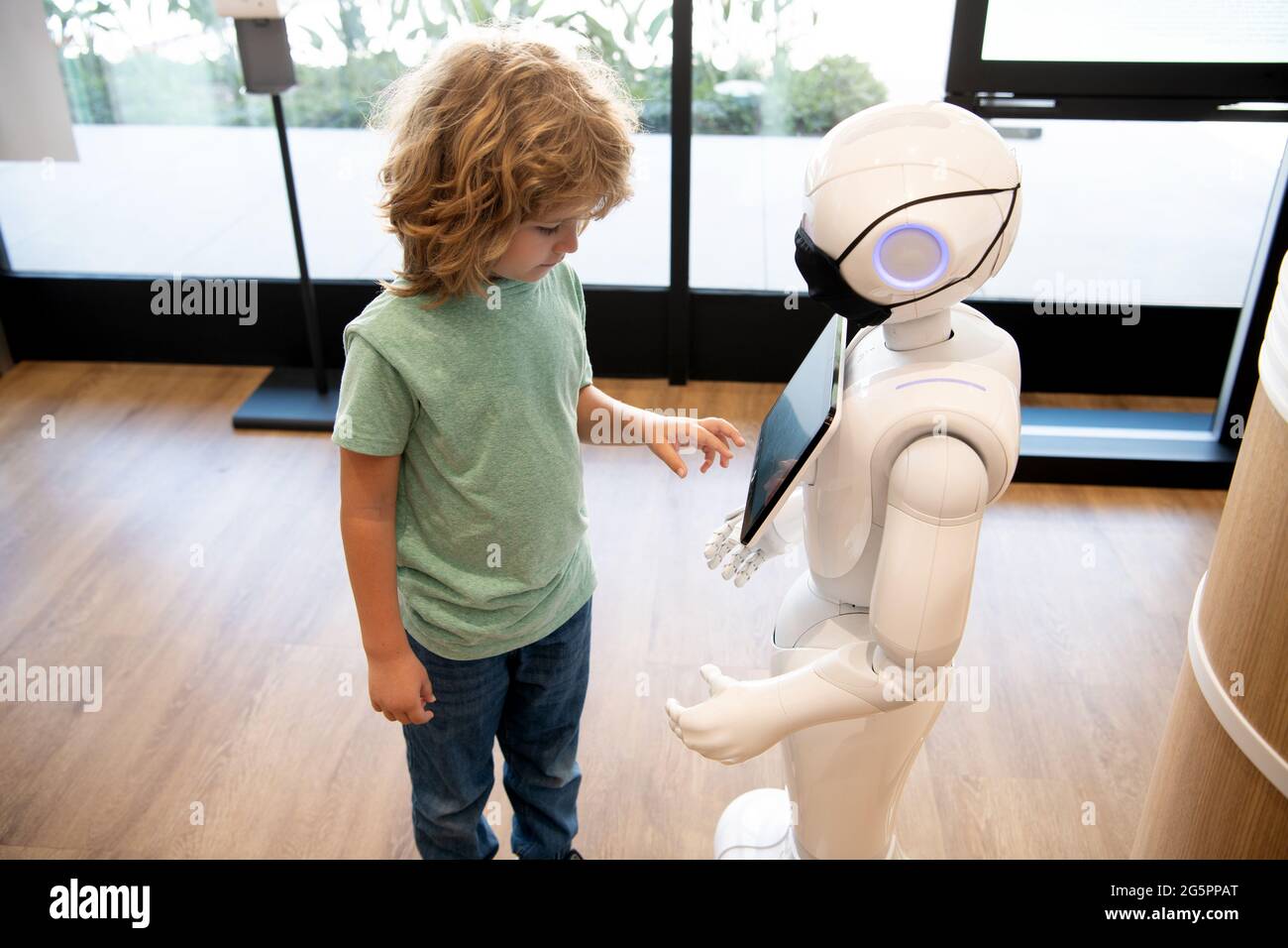 robot provide assistance to child. automation. artificial intelligence ...