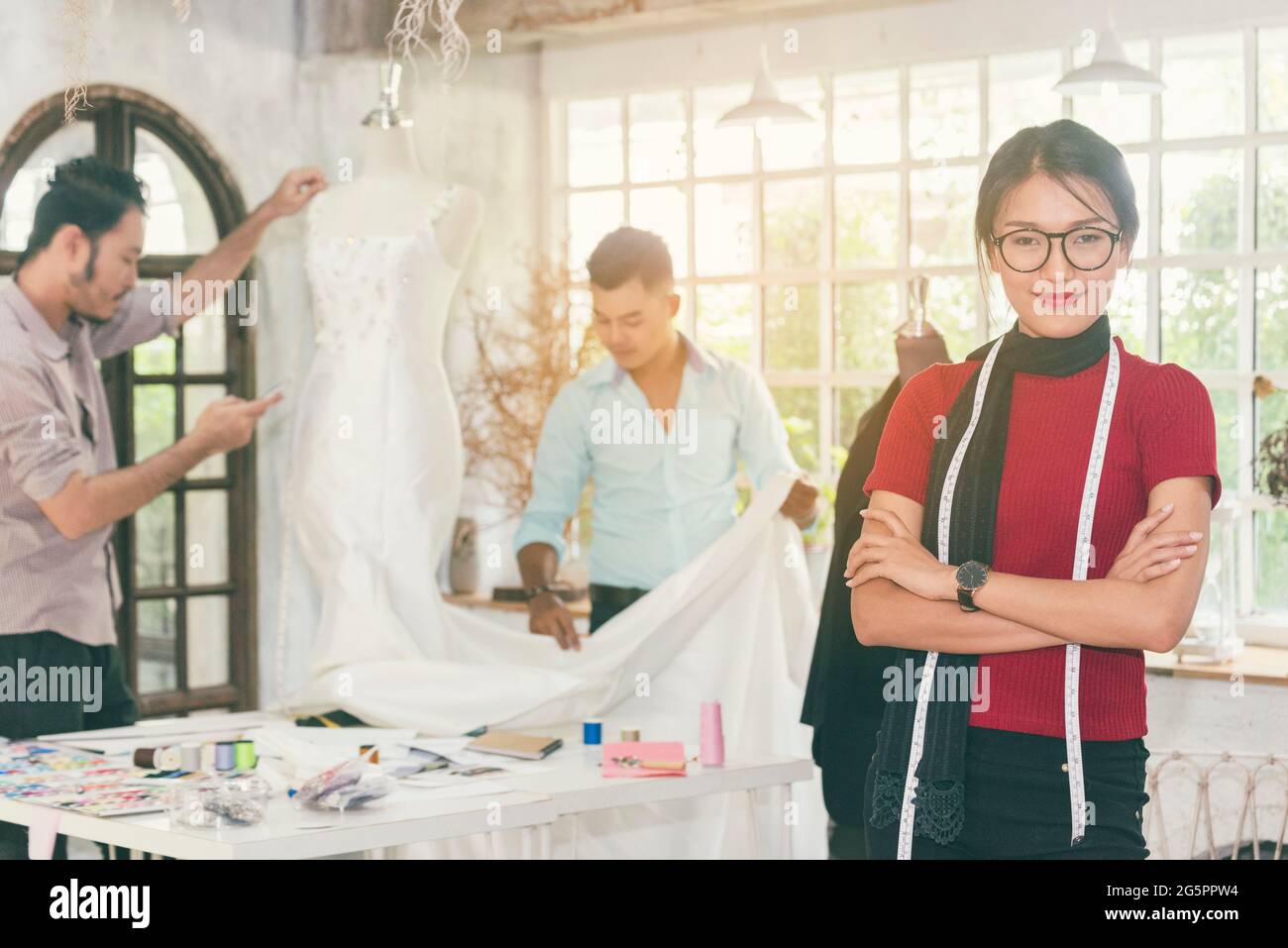 Team of Young Fashion Designers who's Leader of new Trend are creative ...