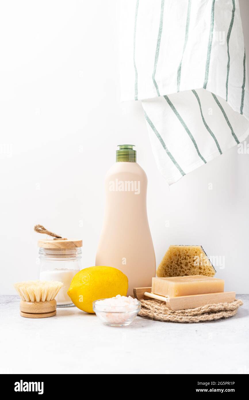 Eco friendly natural cleaners, jar with baking soda, dish brush, lemon ...