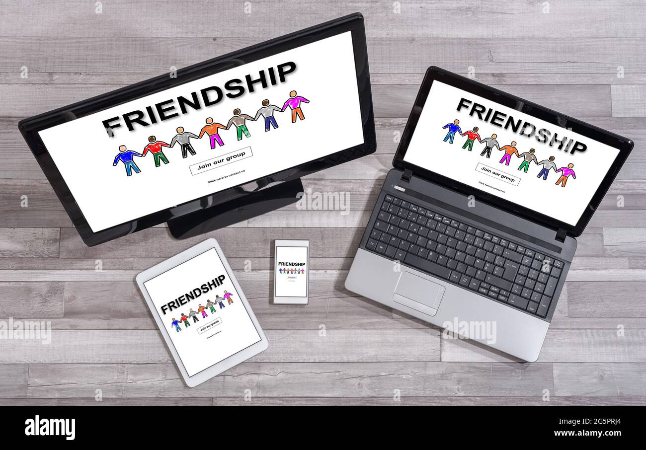 Friendship concept shown on different information technology devices ...