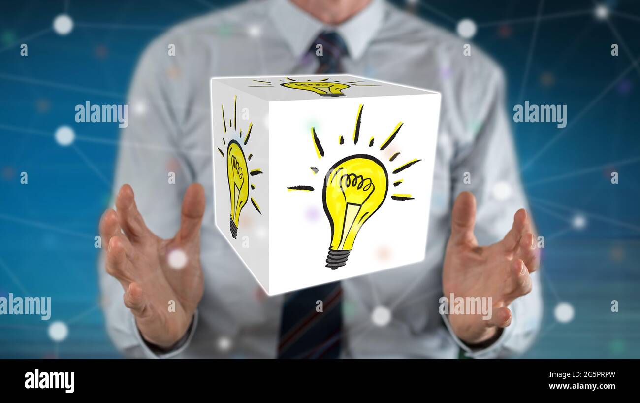 Innovation concept between hands of a man in background Stock Photo - Alamy