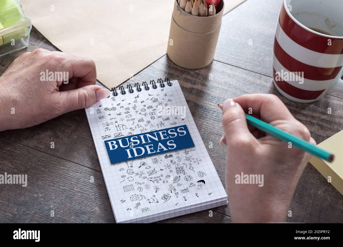 Business ideas concept drawn on a notepad Stock Photo - Alamy