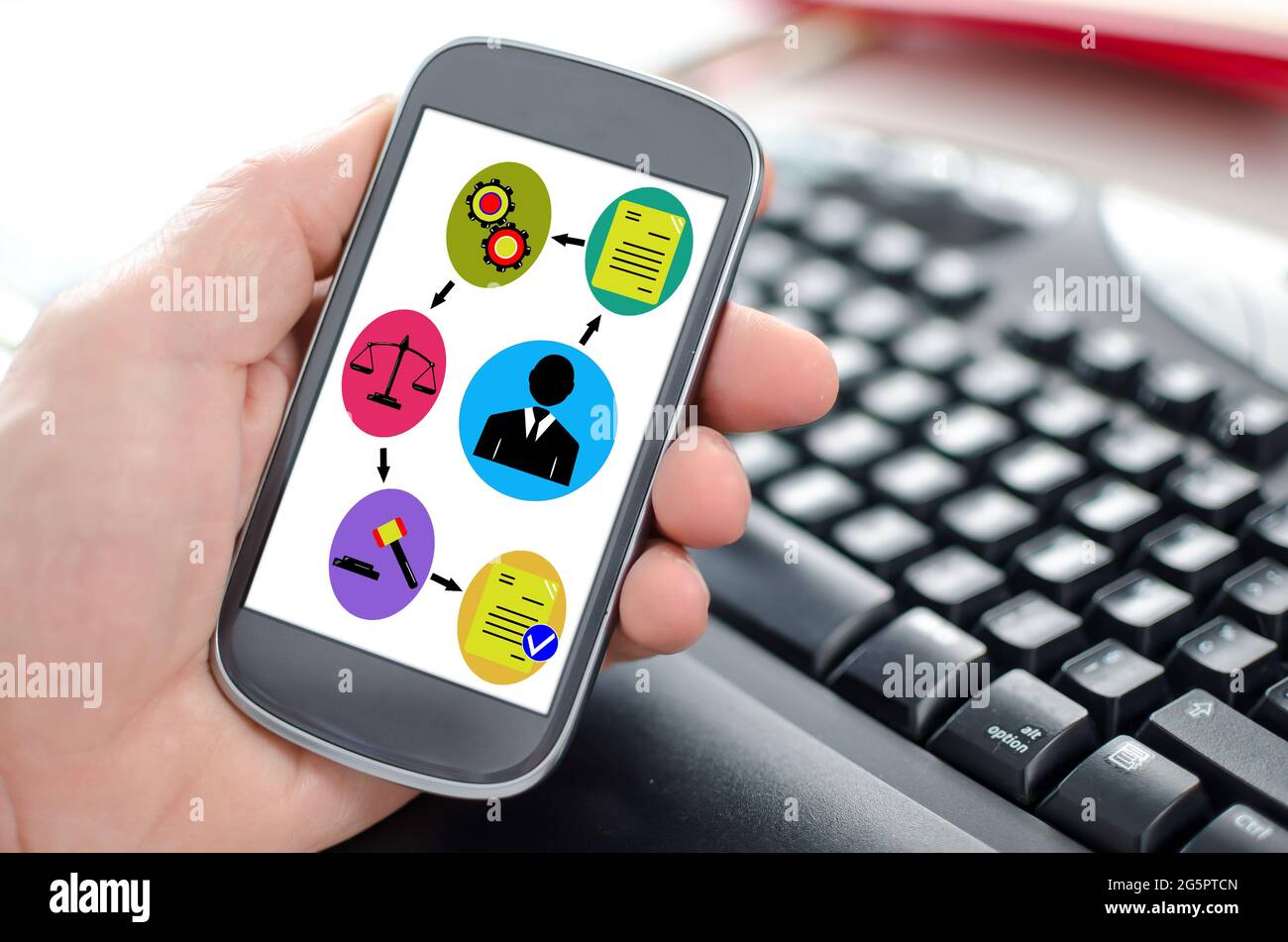 Hand holding a smartphone showing a document validation process concept ...