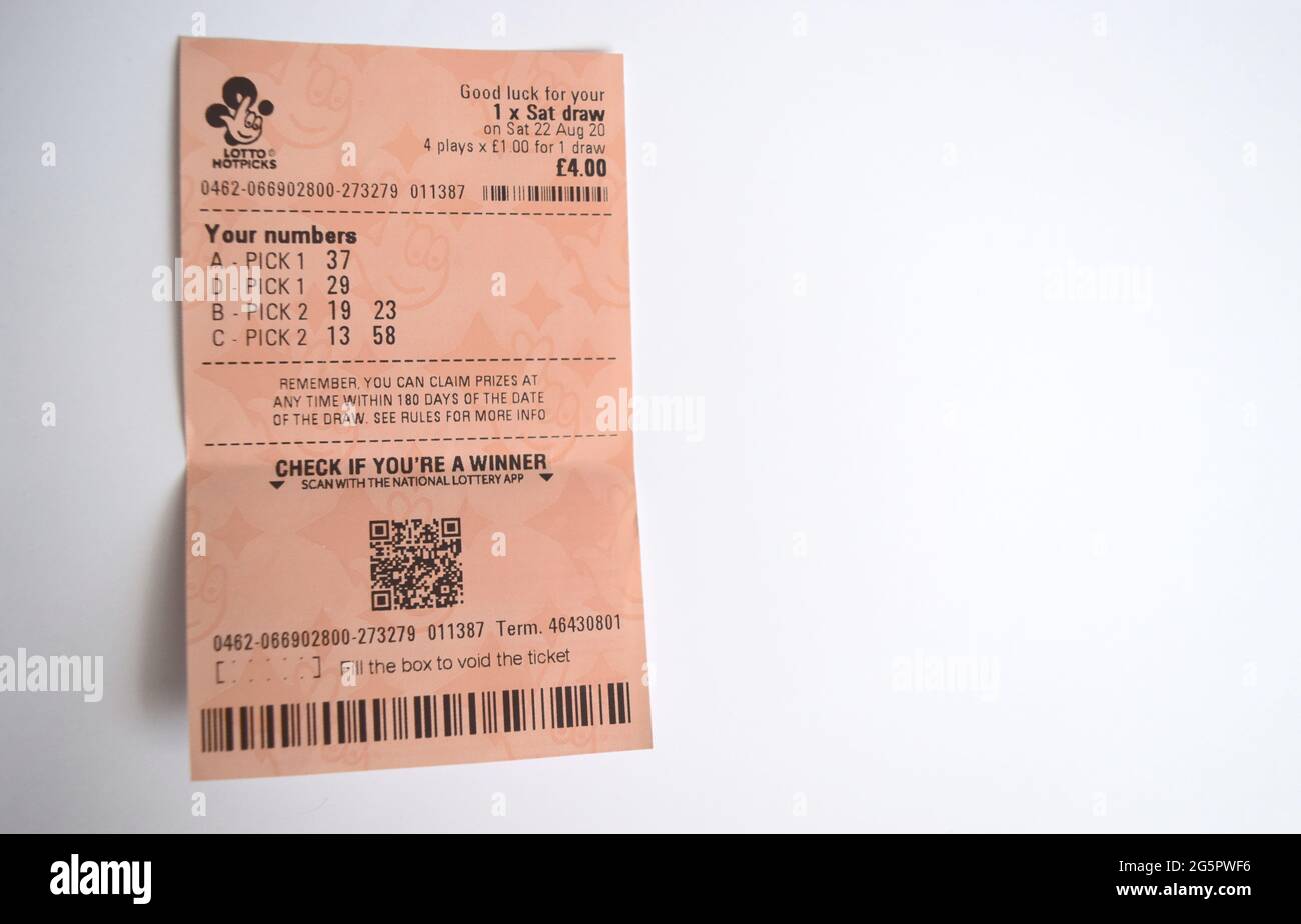 UK National lottery tickets on light background Stock Photo - Alamy