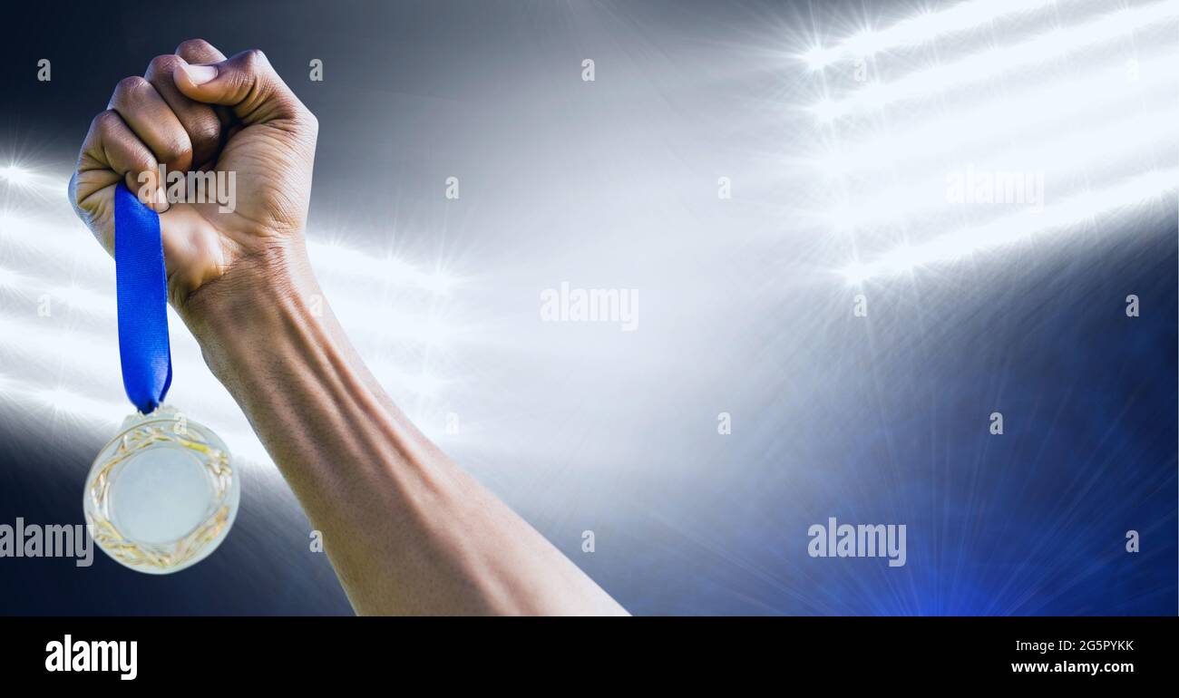 Hand holding medals hi-res stock photography and images - Alamy