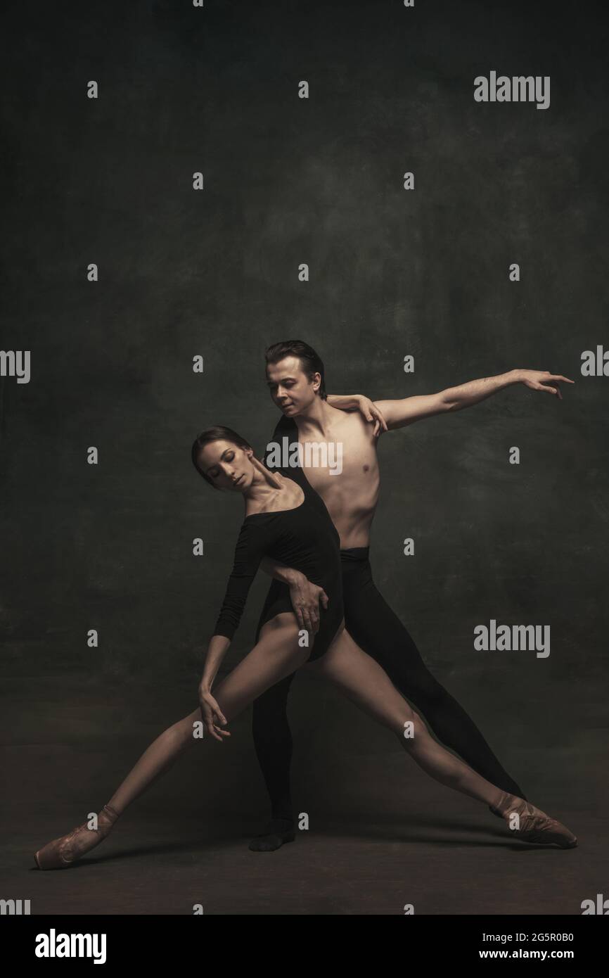 Beautiful graceful woman and man, ballet dancers in art performance ...
