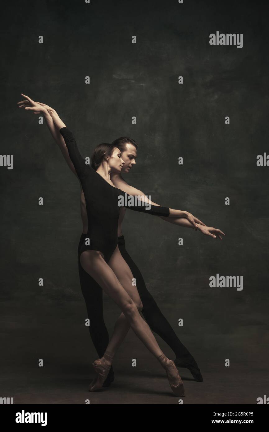 Beautiful graceful woman and man, ballet dancers in art performance ...