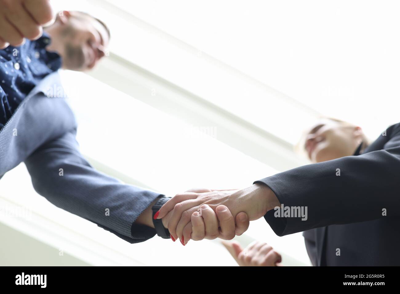 Truce handshake hi-res stock photography and images - Alamy