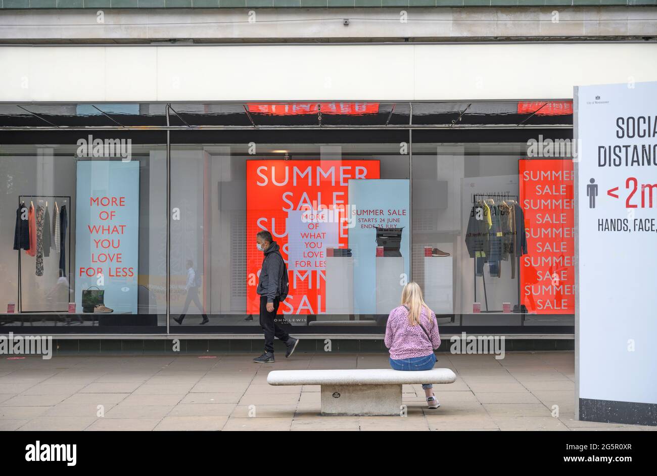 Oxford Street, London, UK. 29 June 2021. Window display with sale signs ...