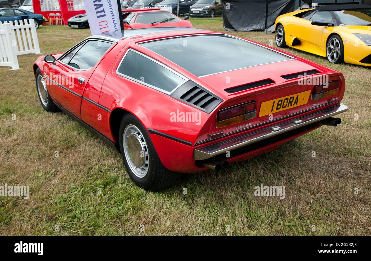 Three-quarters rear view of a Red, 1972, Maserati Bora, on display at ...