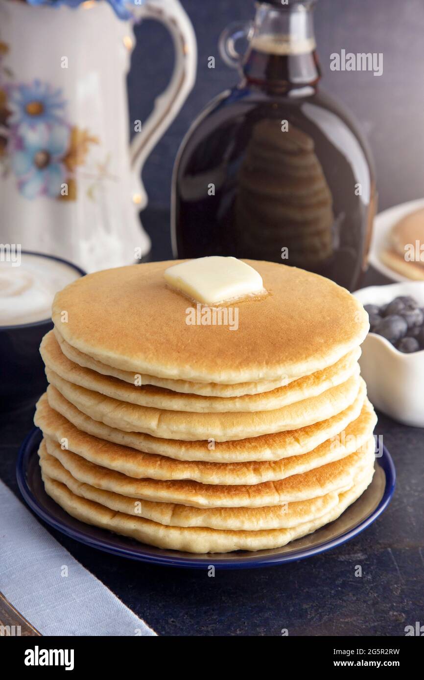 Stack of Freshly Made American Style Pancakes with Metling Butter Stock ...