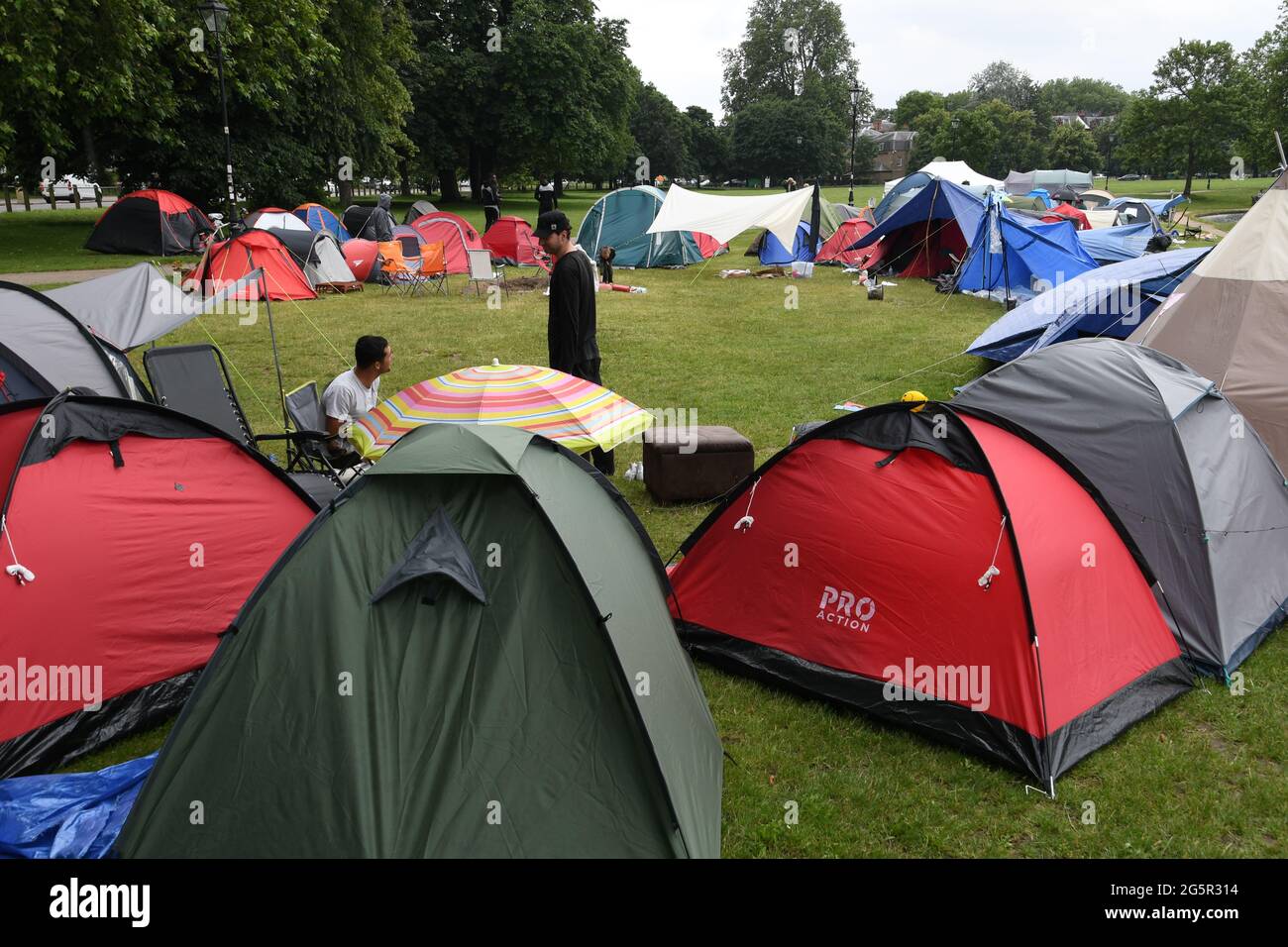 London, UK, 29 June 2021, Forty camping tents in Clapham Common are ...