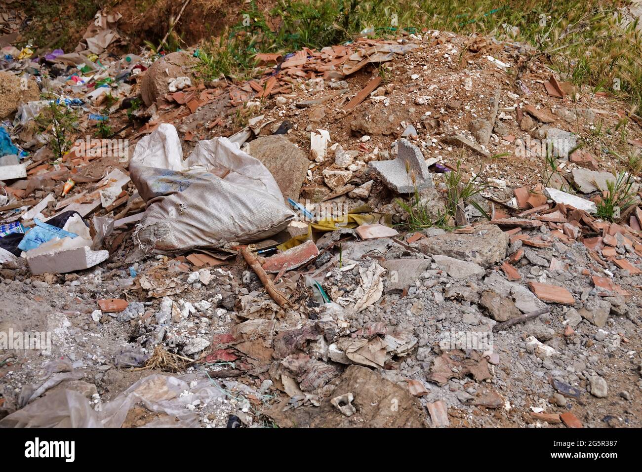 Shot of garbage on the ground Stock Photo - Alamy