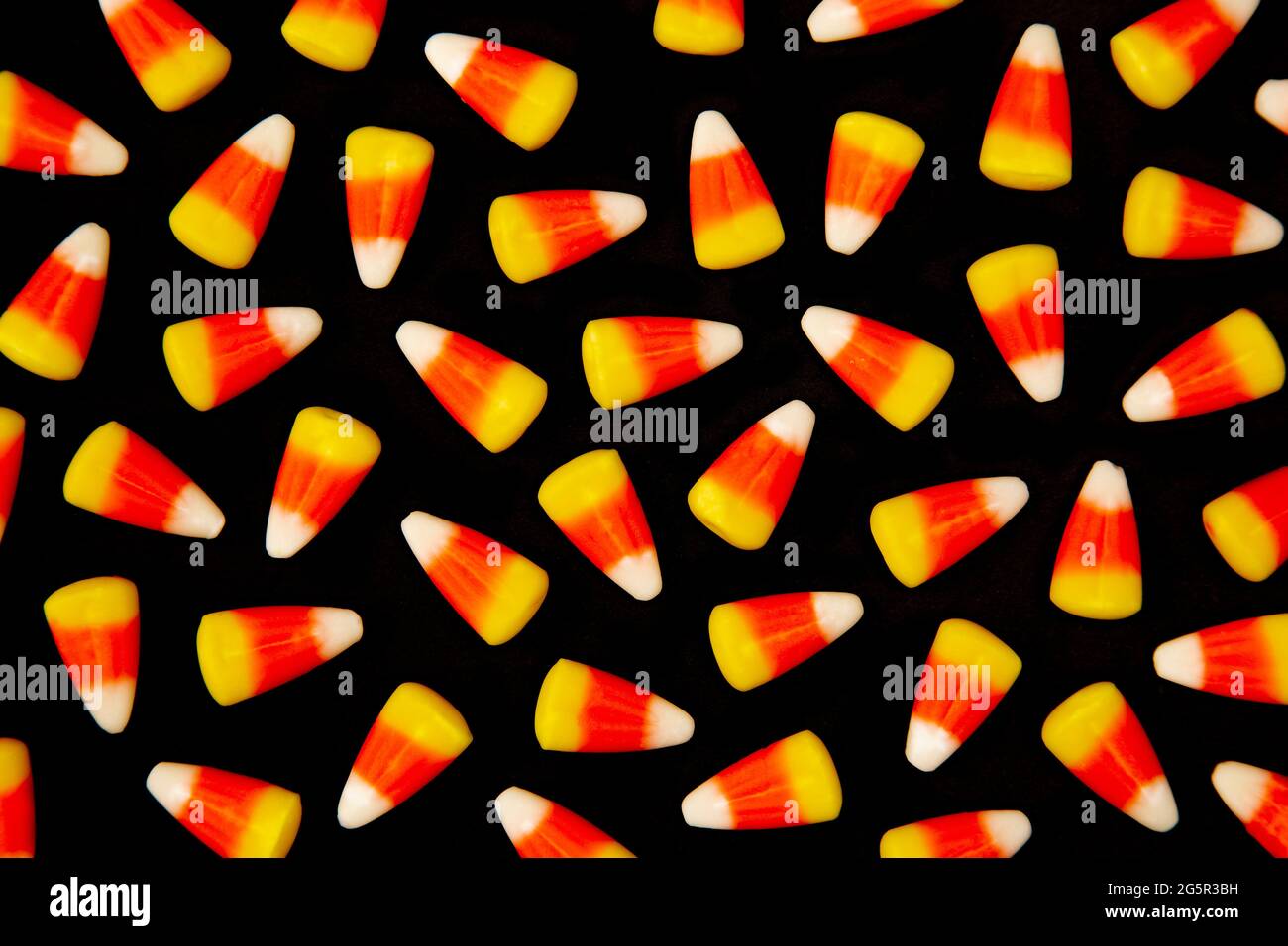 Halloween Candy Candy Background on a Black Surface Stock Photo - Alamy