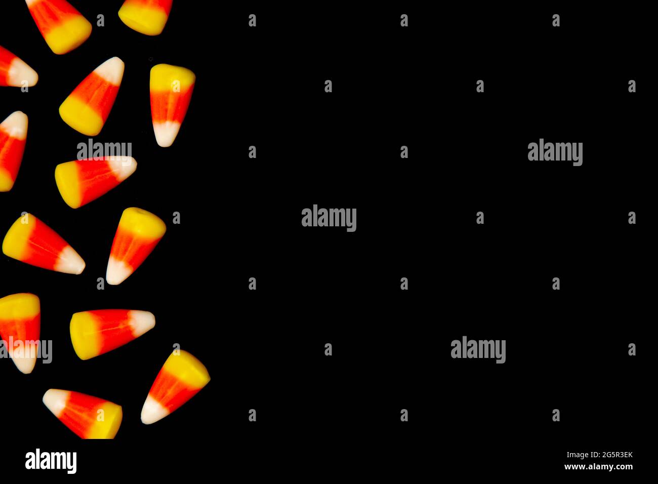 Halloween Candy Candy Background on a Black Surface Stock Photo - Alamy
