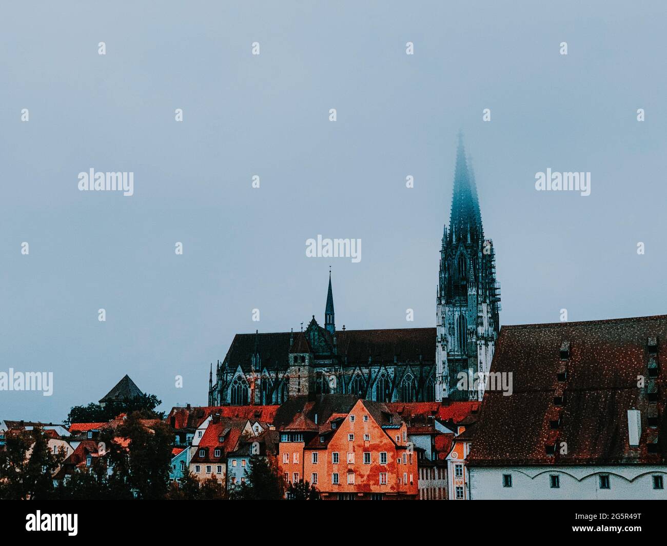 Eerie scenery of the old castle from the Stone Bridge, Regensburg ...