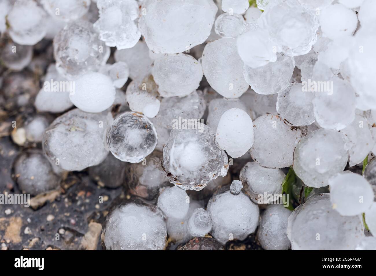A pile of large hail on the ground Stock Photo - Alamy