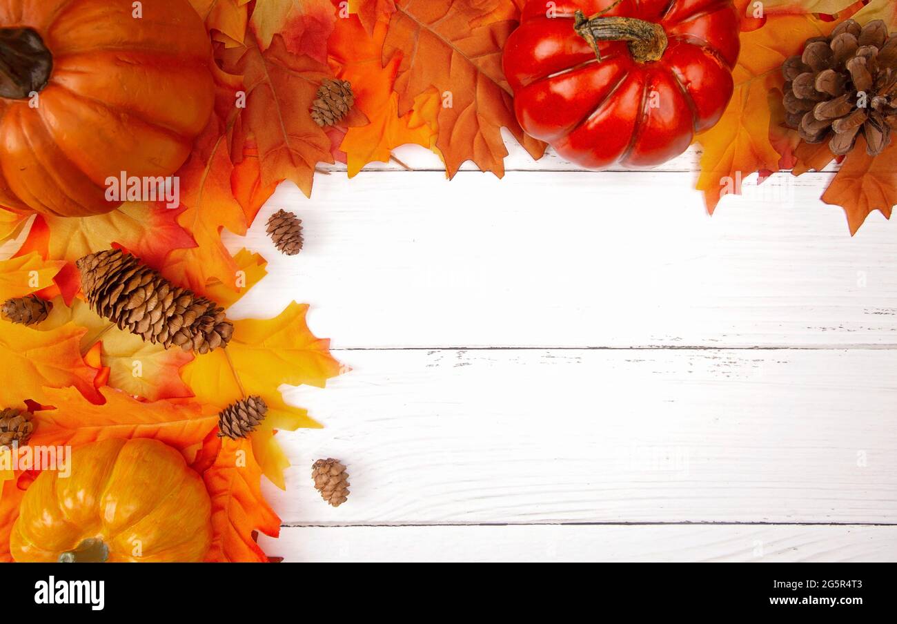 Fall Border Background on a White Wood Surface Stock Photo - Alamy