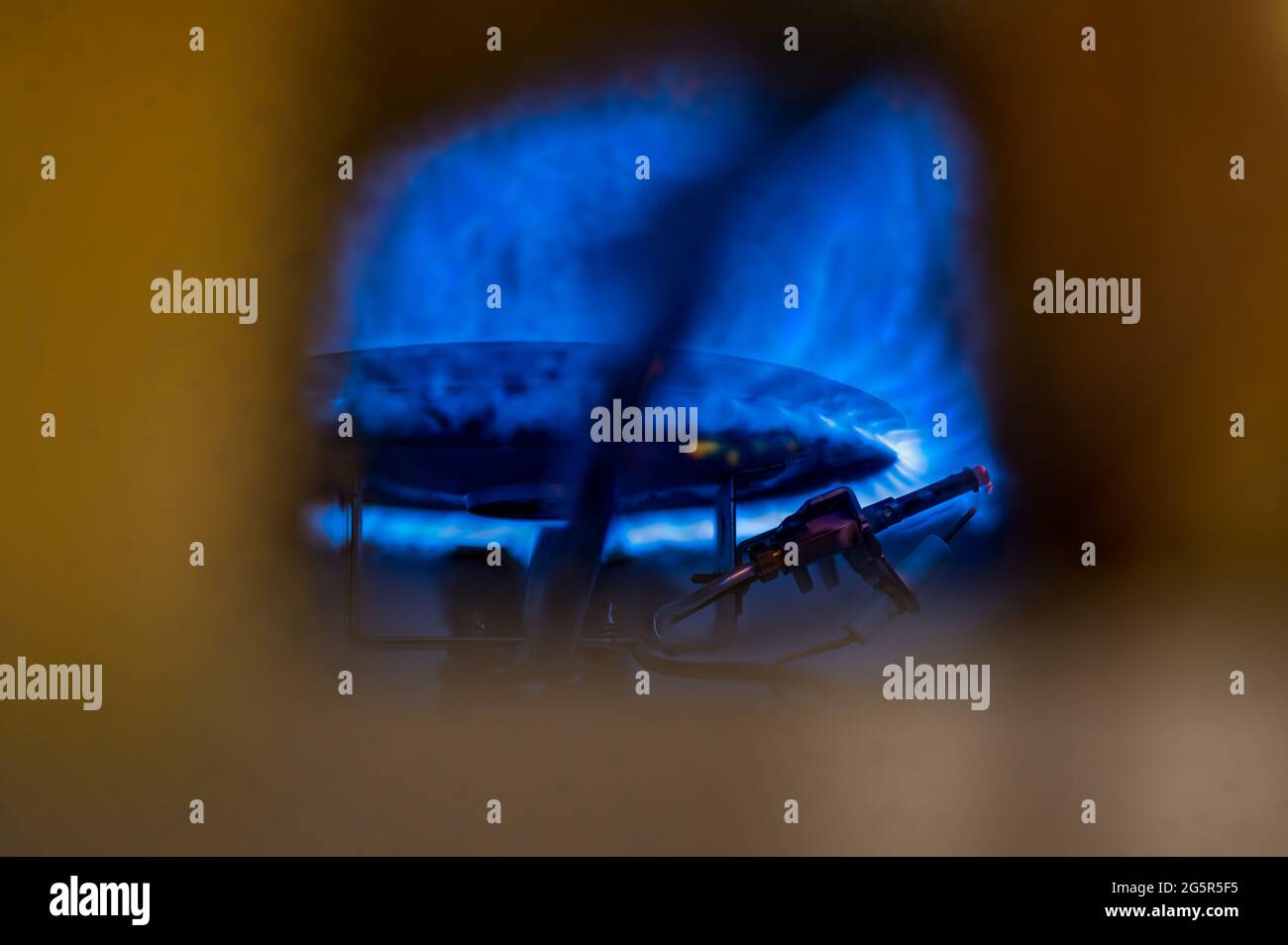 Pilot light auto igniter inside a hot water heater with flames Stock ...