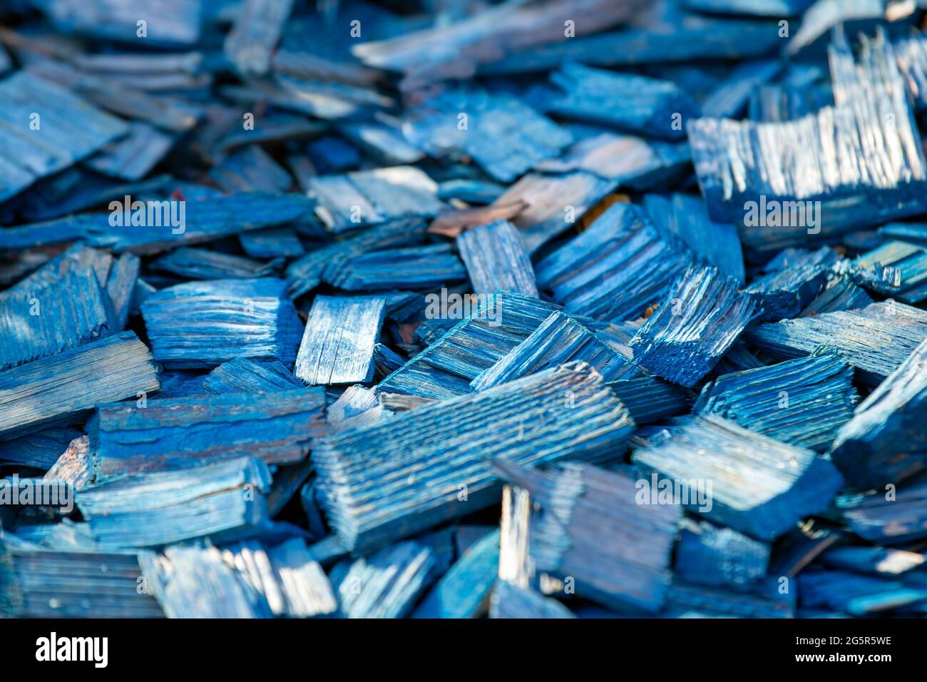 chopped pieces of colored wood for soil decoration Stock Photo - Alamy