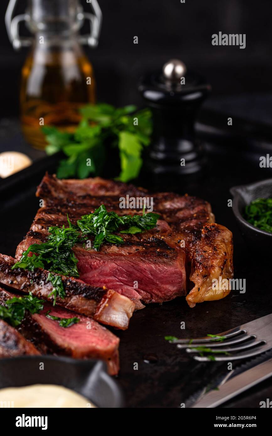 Grilled marbled rib eye steak Stock Photo - Alamy