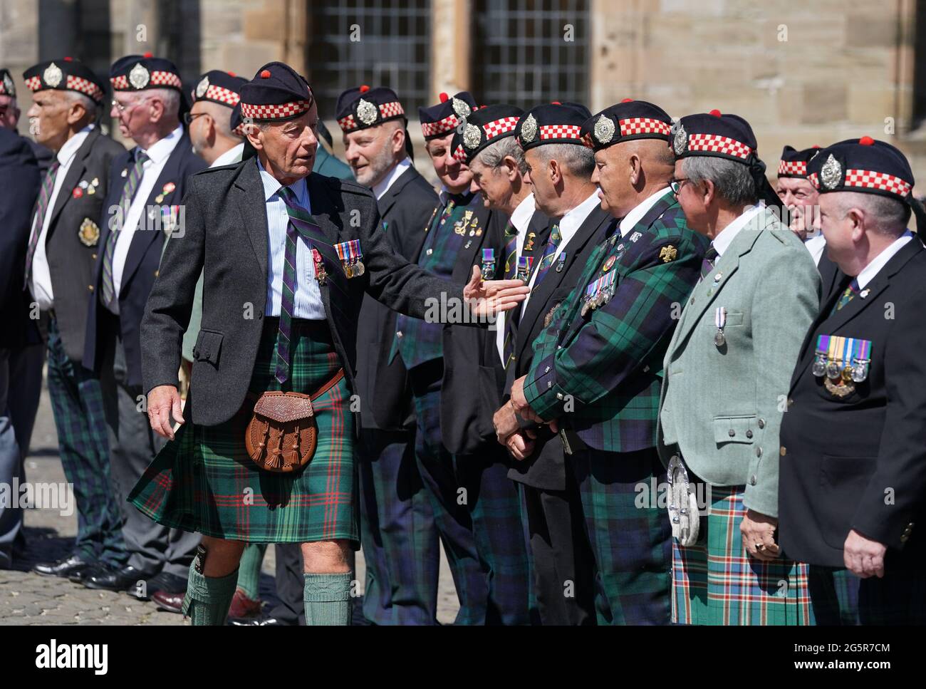 Argyll and Sutherland Highlander veterans await the arrival of Queen ...
