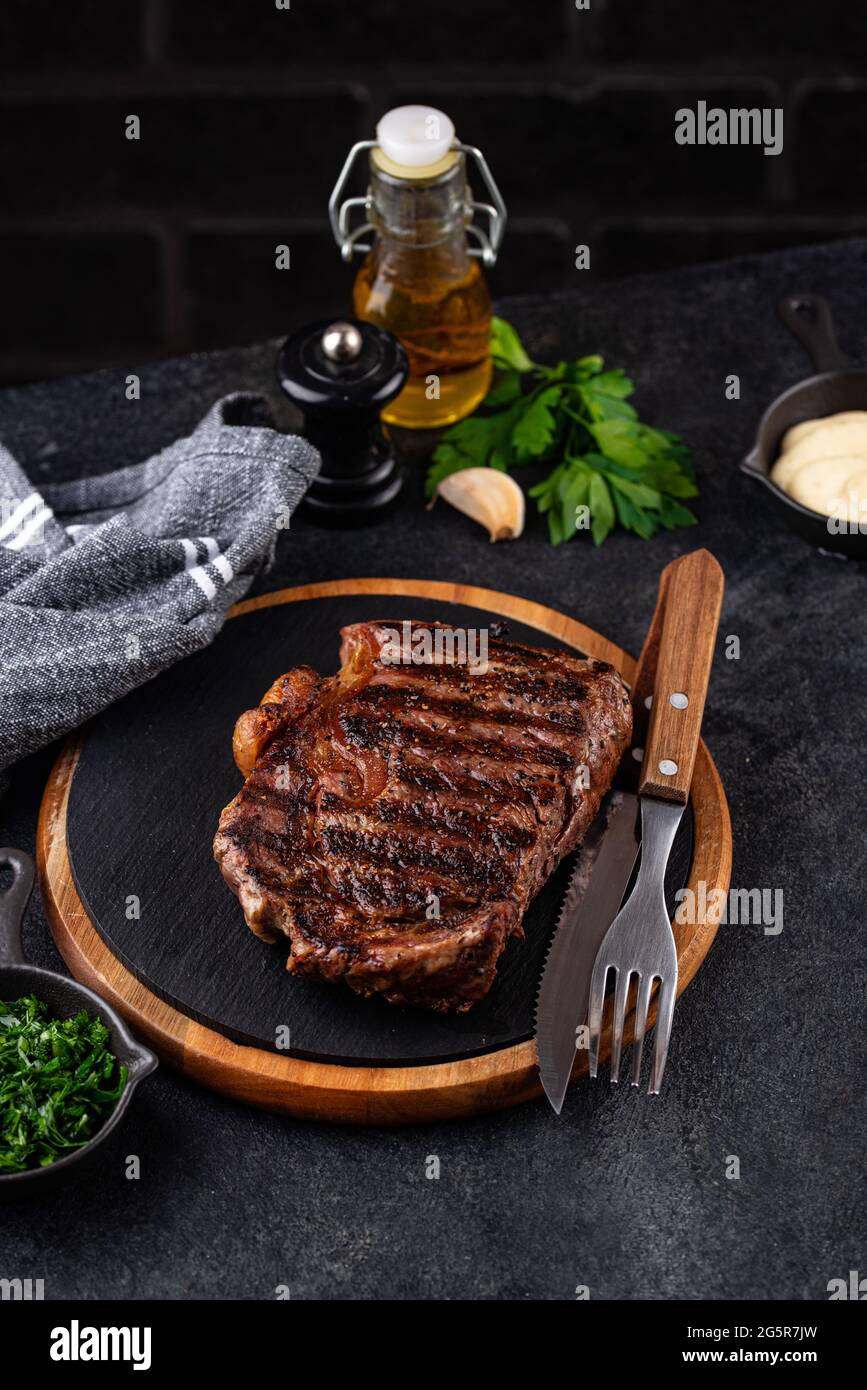Grilled marbled rib eye steak Stock Photo - Alamy