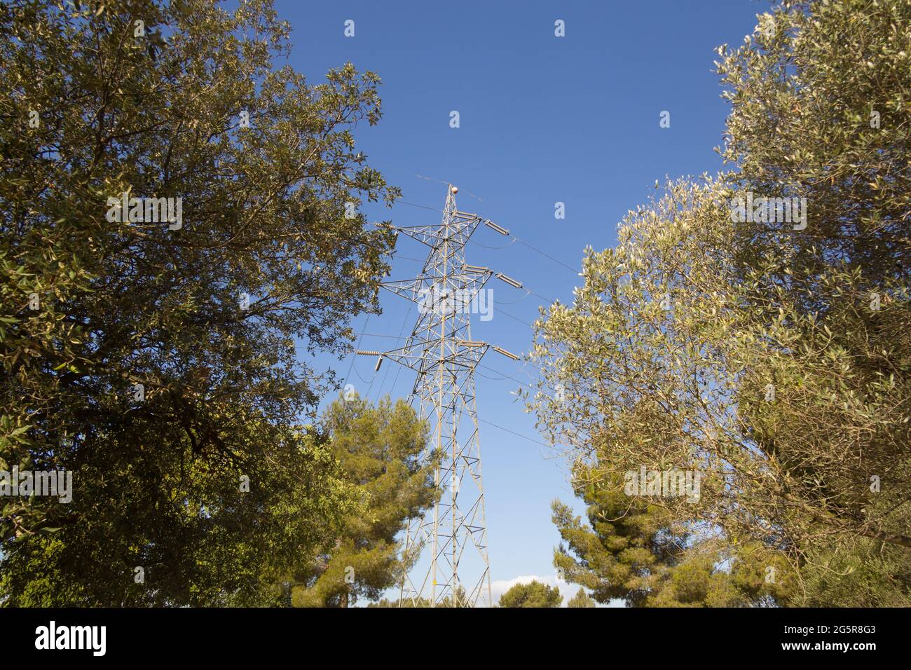 An electric tower in the mountains, overcoming the mountainous terrain ...