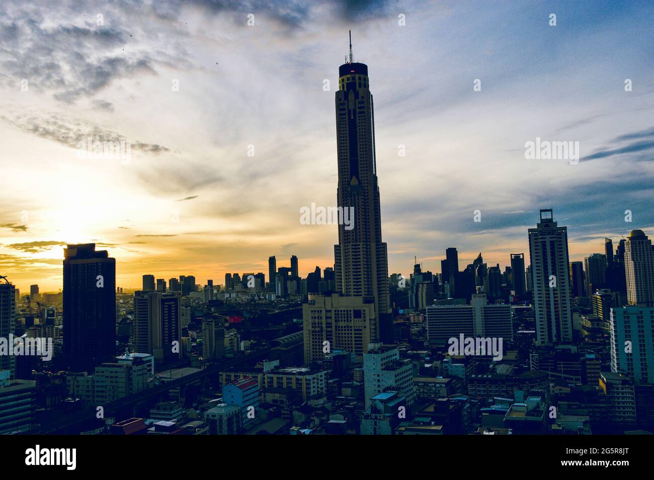 Clouds and sunlight in the morning sent down to hit the building in ...