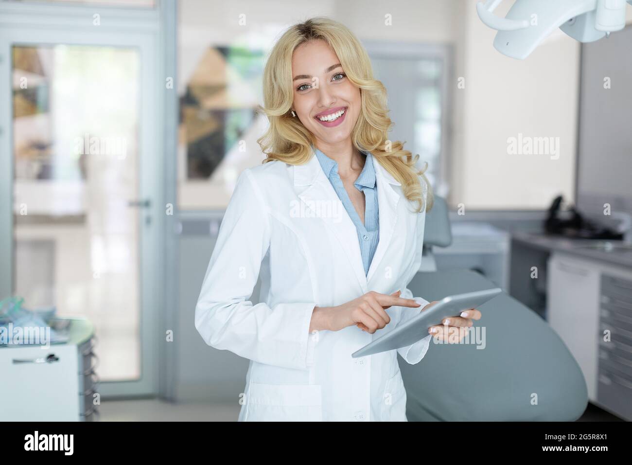 Pretty blonde female doctor hi-res stock photography and images - Alamy