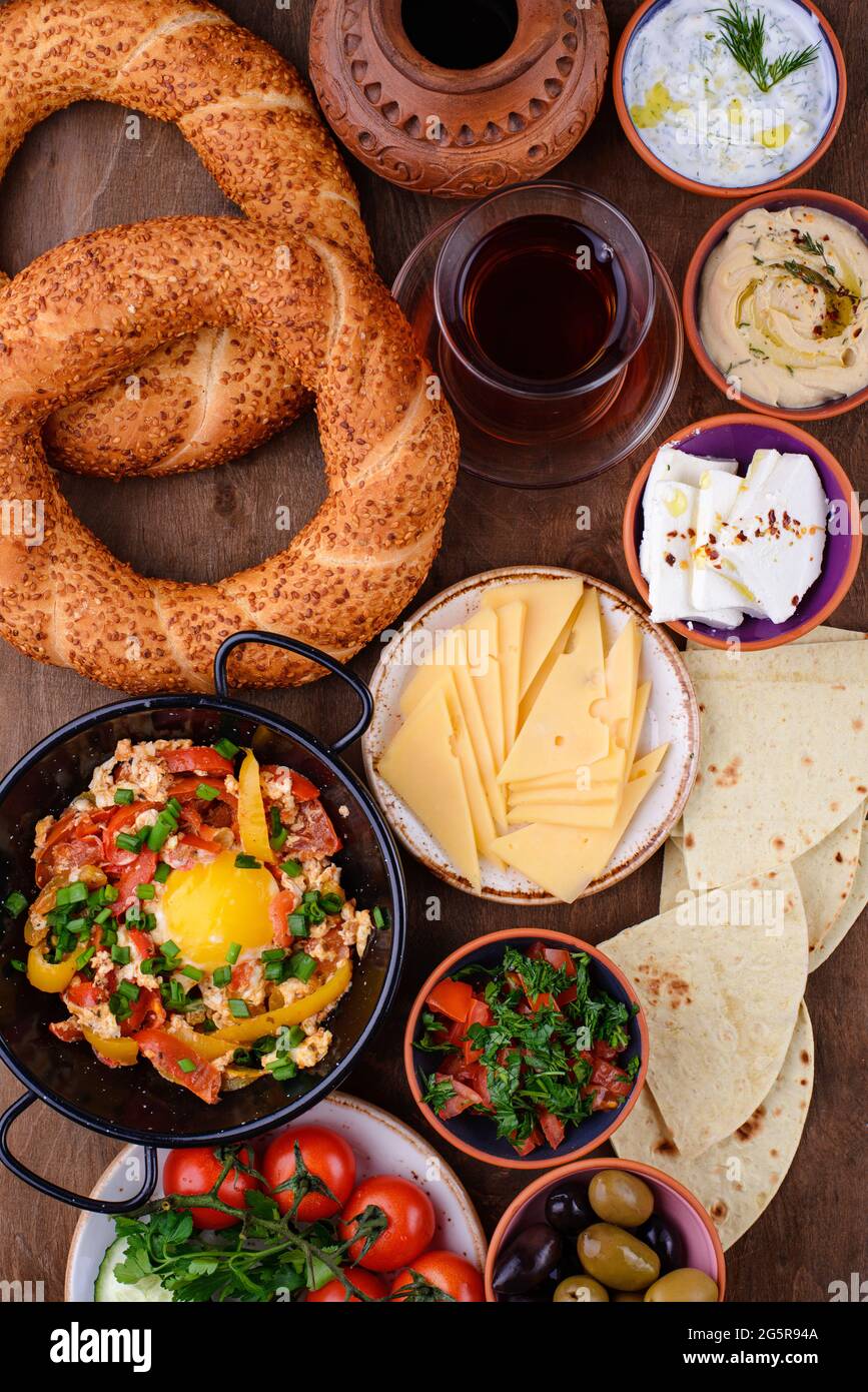 Traditional Turkish breakfast with meze and simit Stock Photo - Alamy