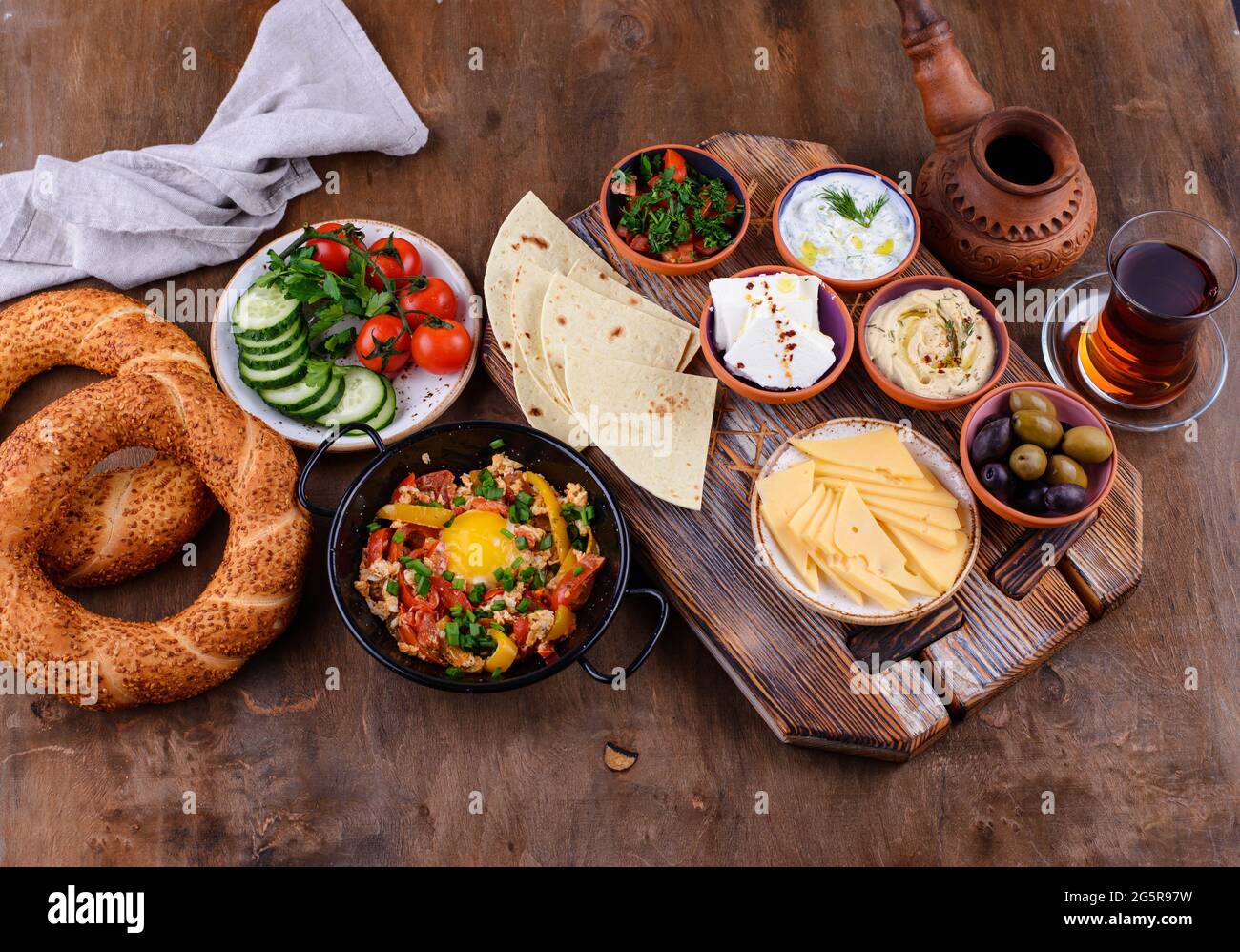 Traditional Turkish breakfast with meze and simit Stock Photo - Alamy