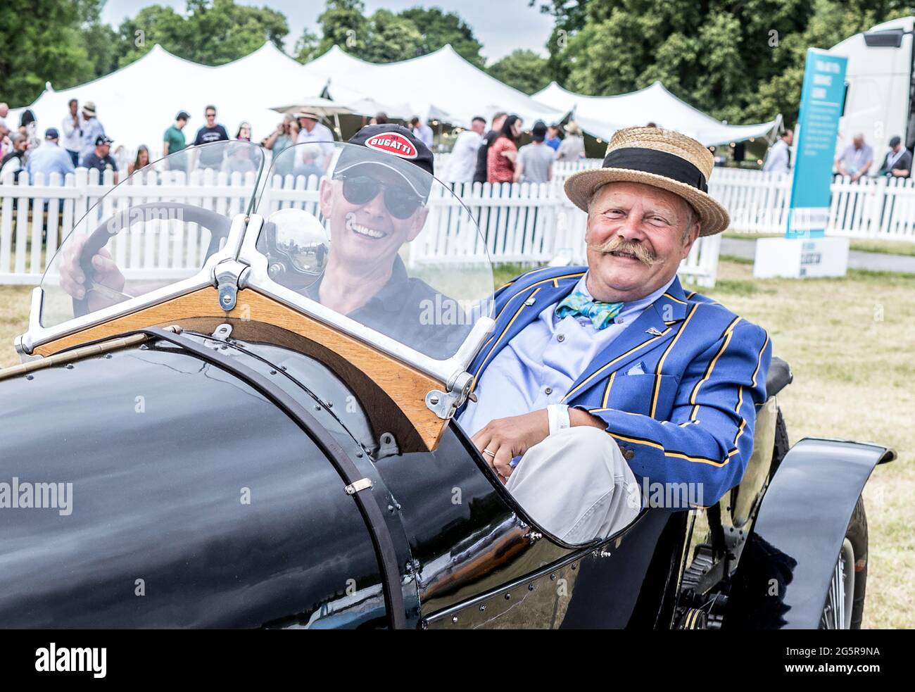 Passengers sitting in a Type 51 Bugatti at the Classic Car Show Syon ...