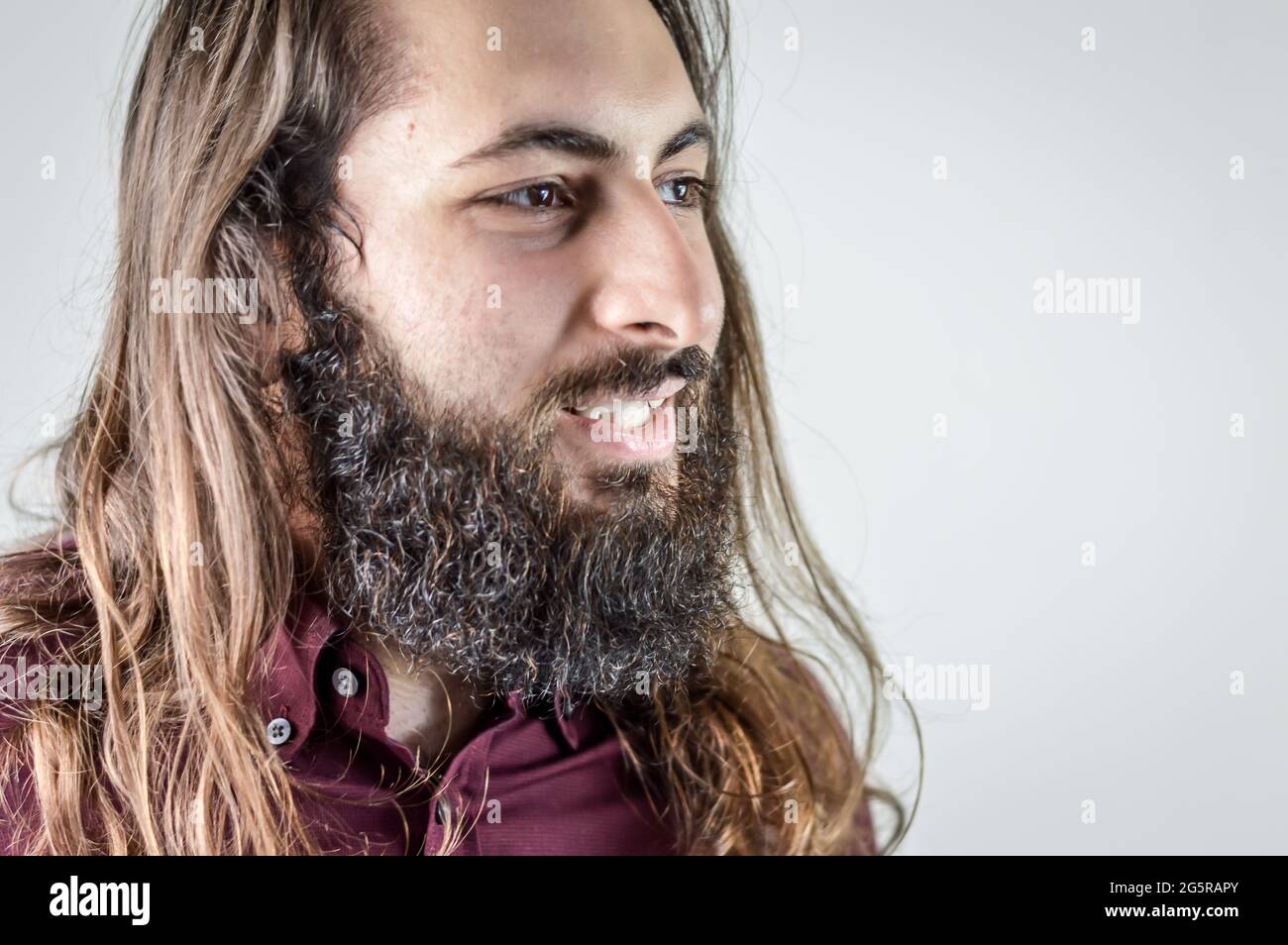 profile portrait of a young middle eastern businessman with beard and ...