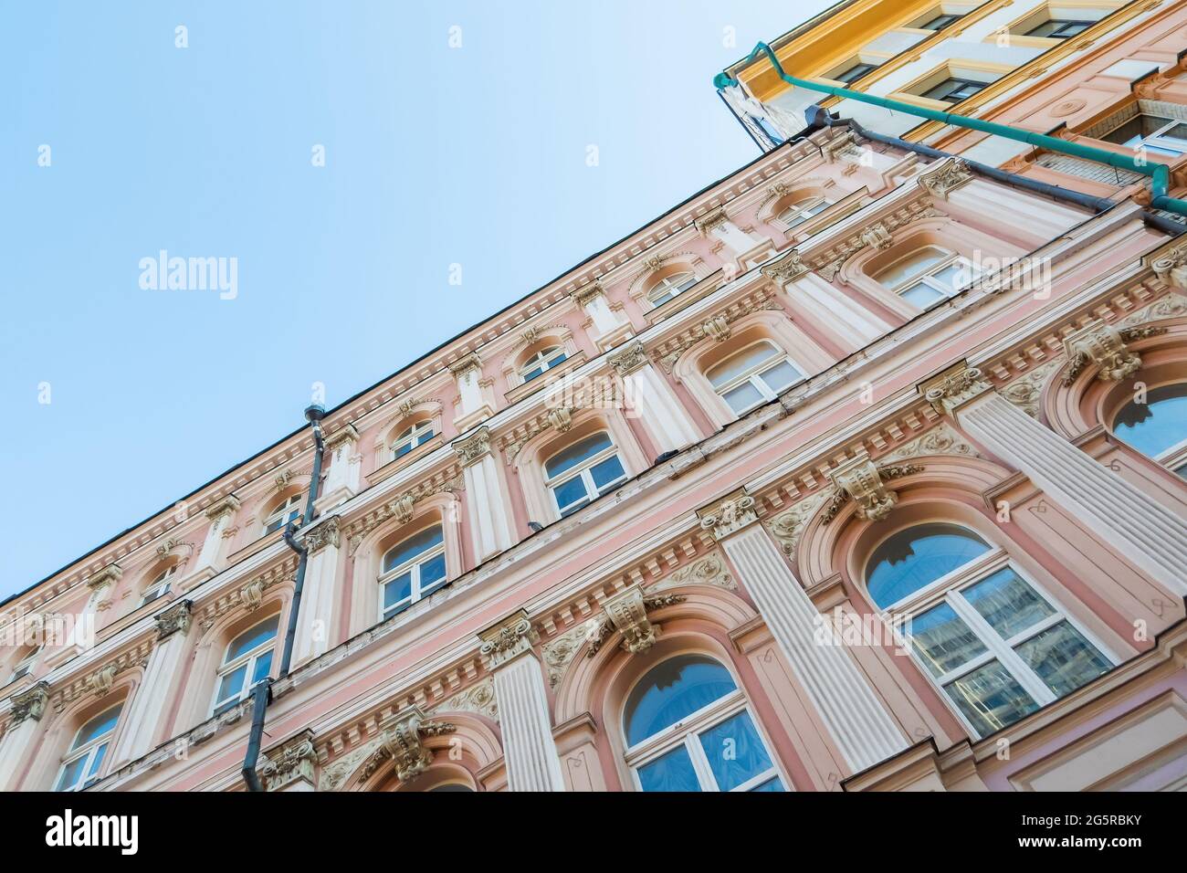Facade of an old building with lots of windows Stock Photo - Alamy