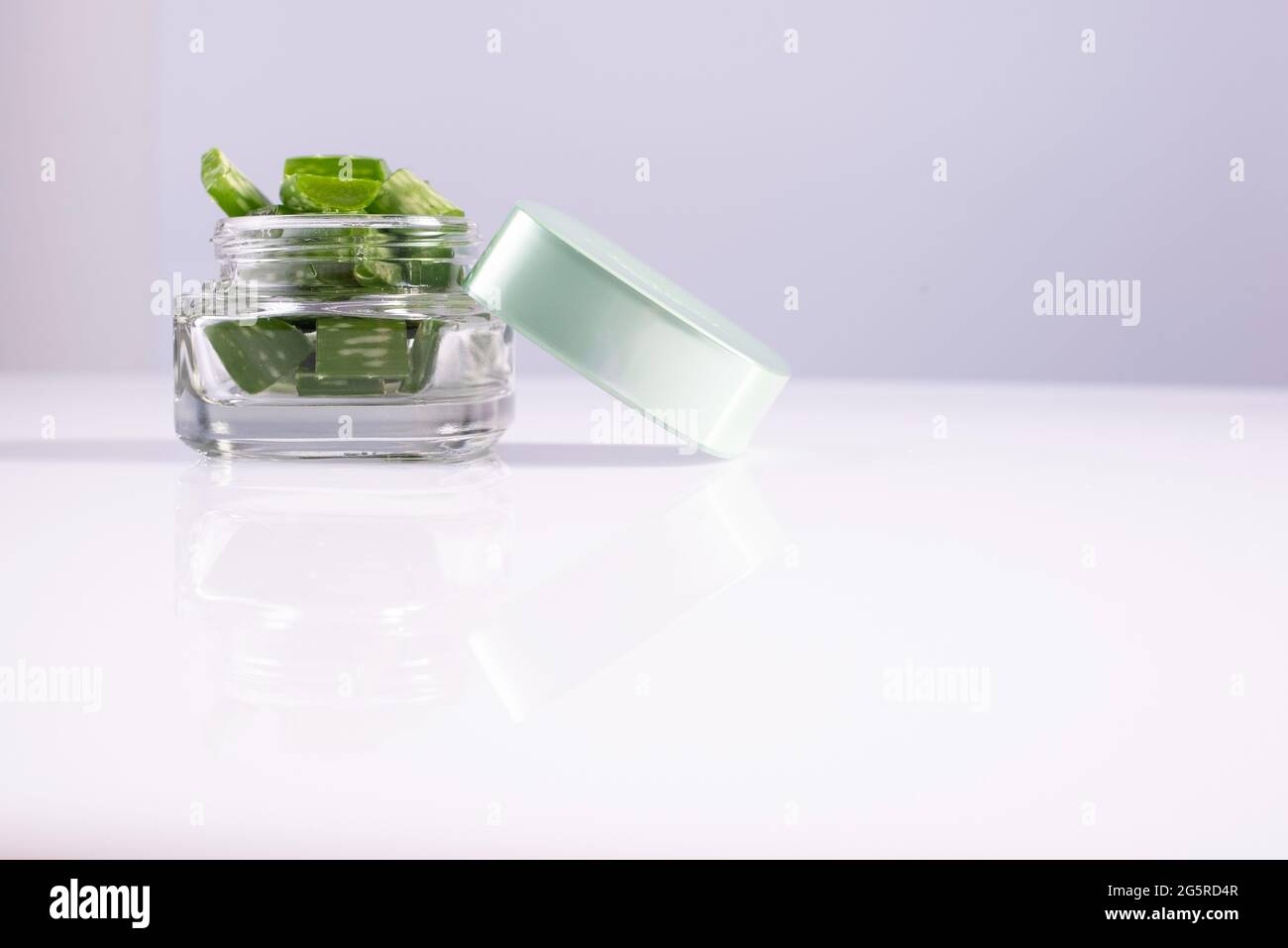 aloe gel cosmetics in a glass container, on a white background Stock ...